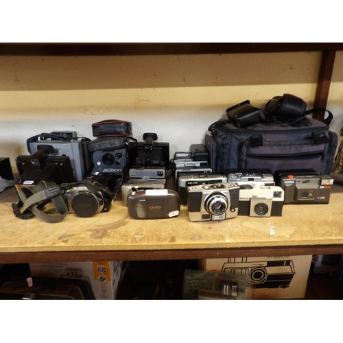 Assorted cameras and photographic equipment