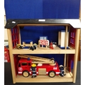 A Brio fire station, fire engine, figures and accessories