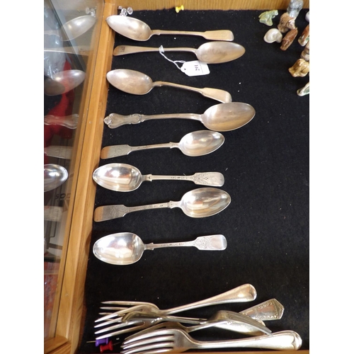 Four solid silver serving spoons together with four solid silver bright ...