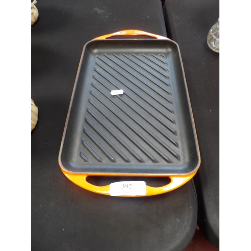 A Le Creuset rectangular griddle pan
