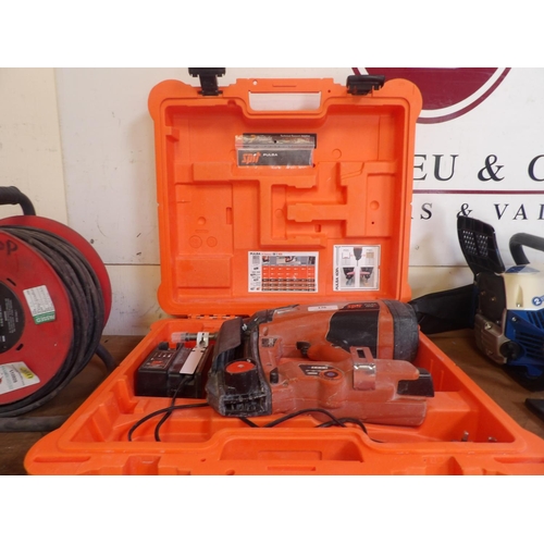 A Pulsa Spit 40P rechargeable nail gun