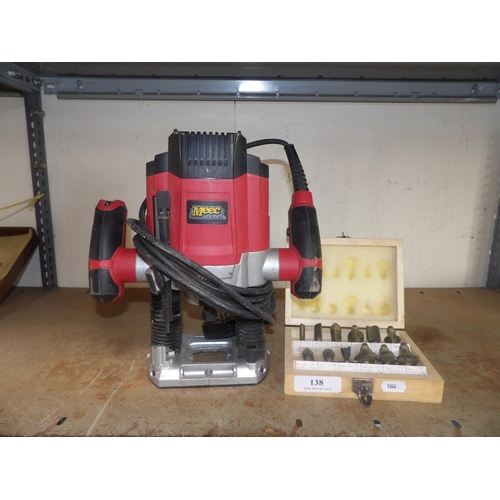 A Meec Tools router together with a set of unused router bits