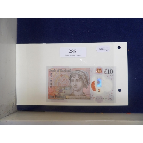 A Bank of England £10 bank note, the serial number terminating in 007