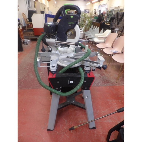 A Festool KS60E Kapex sliding compound mitre saw on stand