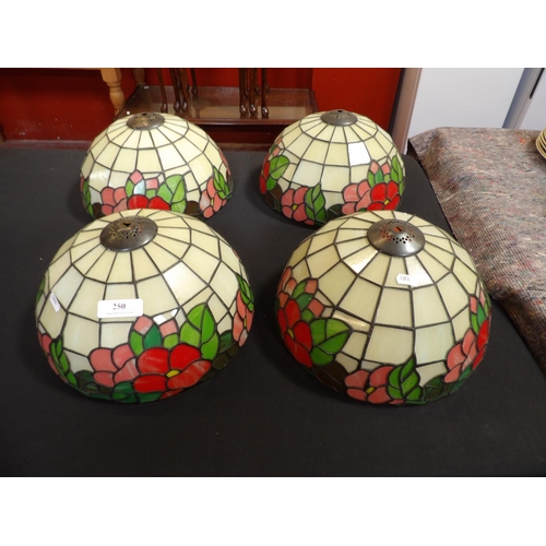 Four lead glazed lamp shades in the Tiffany style