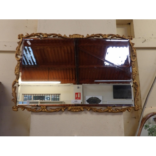 A mid century rectangular gilt framed bevelled wall mirror