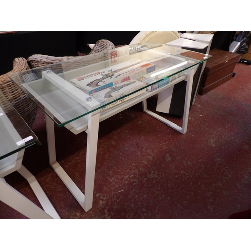 A contemporary glass top display table
