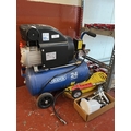 A Draper 24 litre portable workshop compressor together with an air ...