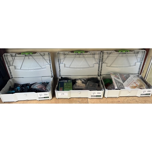 Three Festool systainer boxes containing various accessories