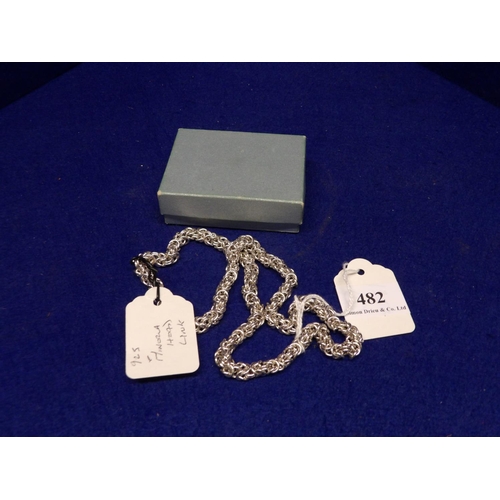 A silver multi link chain