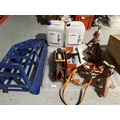 A pair of vehicle inspection ramps, a pair of adjustable axle stands, a ...