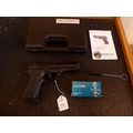 A Bruni Model 92 8mm blank firing pistol together with a box of Fiocchi ...