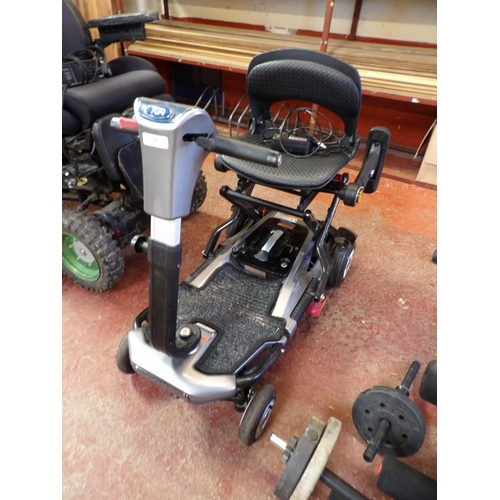 A TGS folding mobility scooter