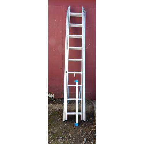 A MacAllister aluminium nine tread triple extension ladder