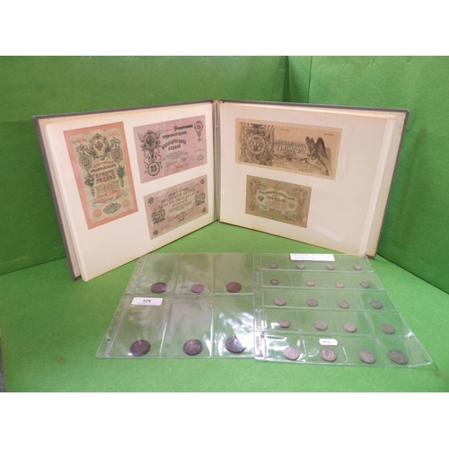 An album of vintage bank notes and tokens together with twenty silver ...