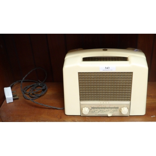 A vintage Ekco white Bakelite wireless set