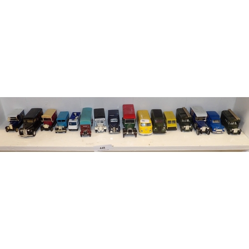 A collection of diecast model commercial vehicles