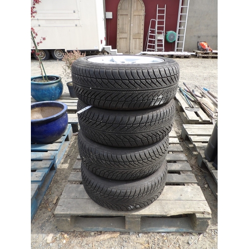 A set of four Dezent aluminium car wheels fitted M+S 205/55R16 tyres