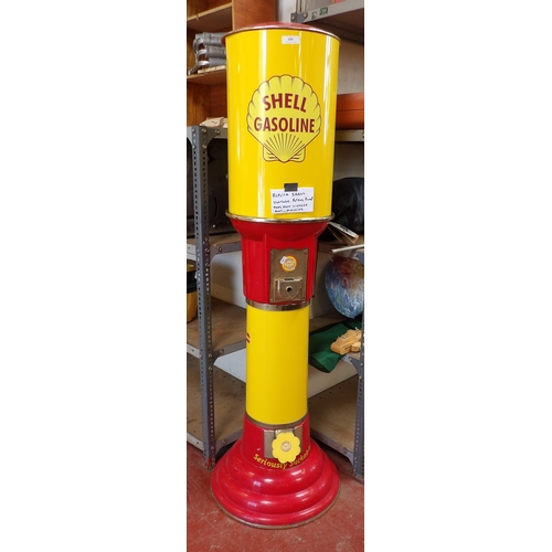 A replica vintage Shell petrol pump repurposed from a vintage slot machine