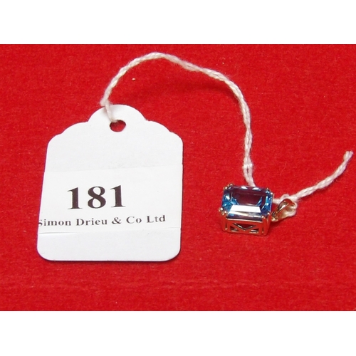 A 9 carat gold blue topaz pendant