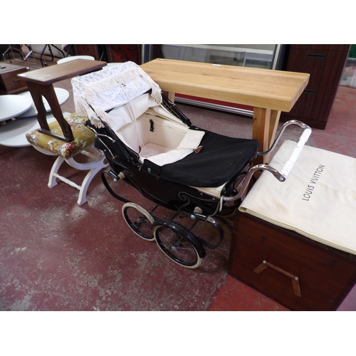 A mid century Silver Cross coach built pram