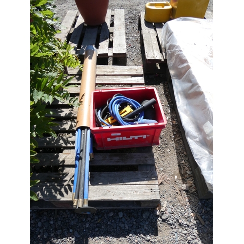 A drain test kit together with a set of drain rods