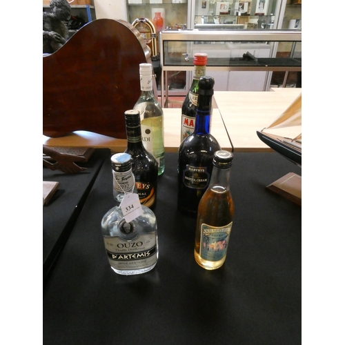 Six bottles of assorted spirits