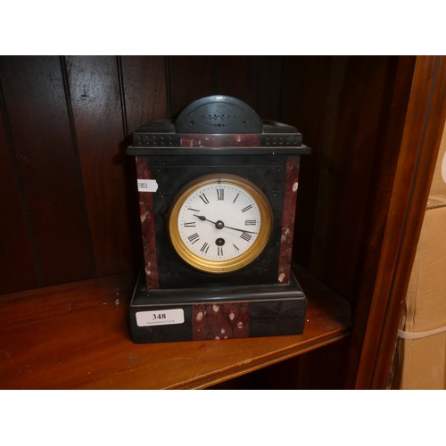 A Victorian slate and marble cased mantle clock