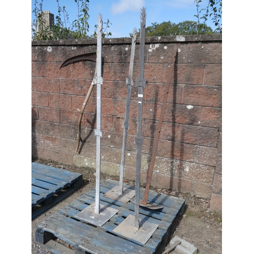Four World War II German military galvanised fencing stakes