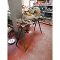 A Makita 110 volt compound mitre saw mounted upon a Performance Power ...