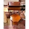 An Edwardian walnut book trough table together with an Edwardian ...