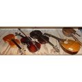 Five assorted stringed instruments