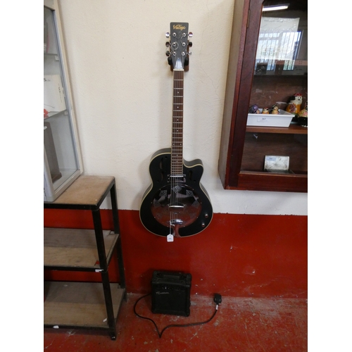 A Vintage electric guitar together with a Rockburn G-10 amplifier