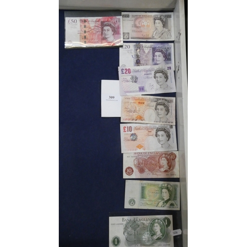 A collection of nine Bank of England bank notes