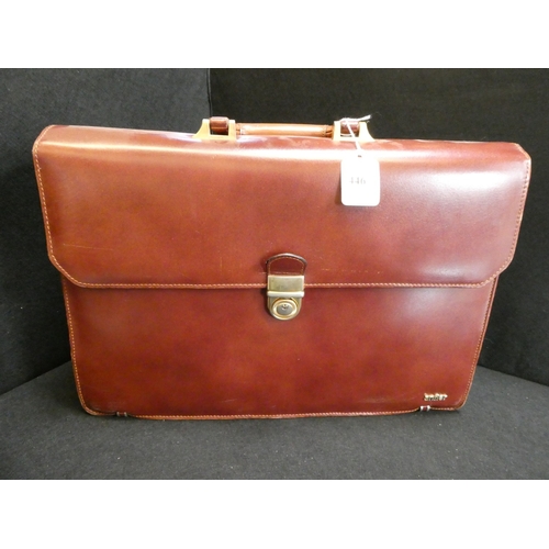 A vintage calf leather document holder and large leather briefcase