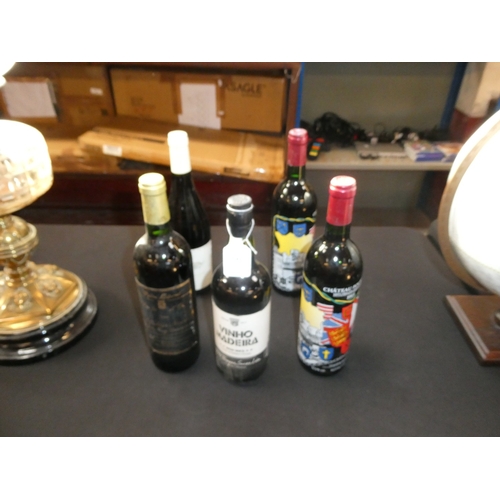 Five bottles of assorted wines