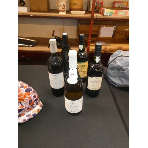 Five bottles of assorted wines