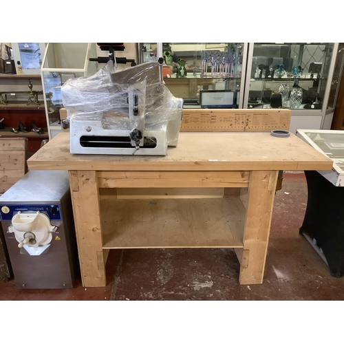 A large pine carpentry work bench