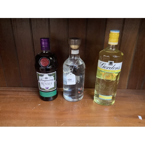 Three bottles of assorted Gins