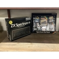 A mid century Sinclair ZX Spectrum + personal computer together with a ...