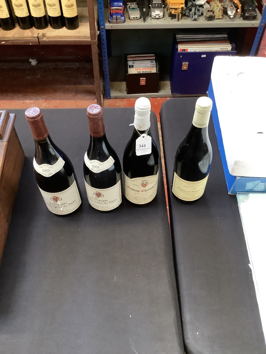 Four bottles of red wine