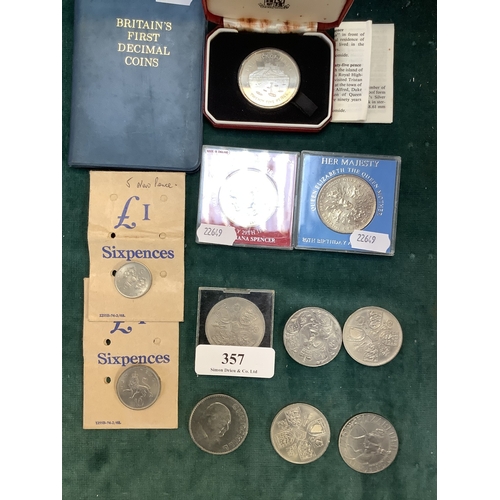 An assortment of vintage and commemorative coinage