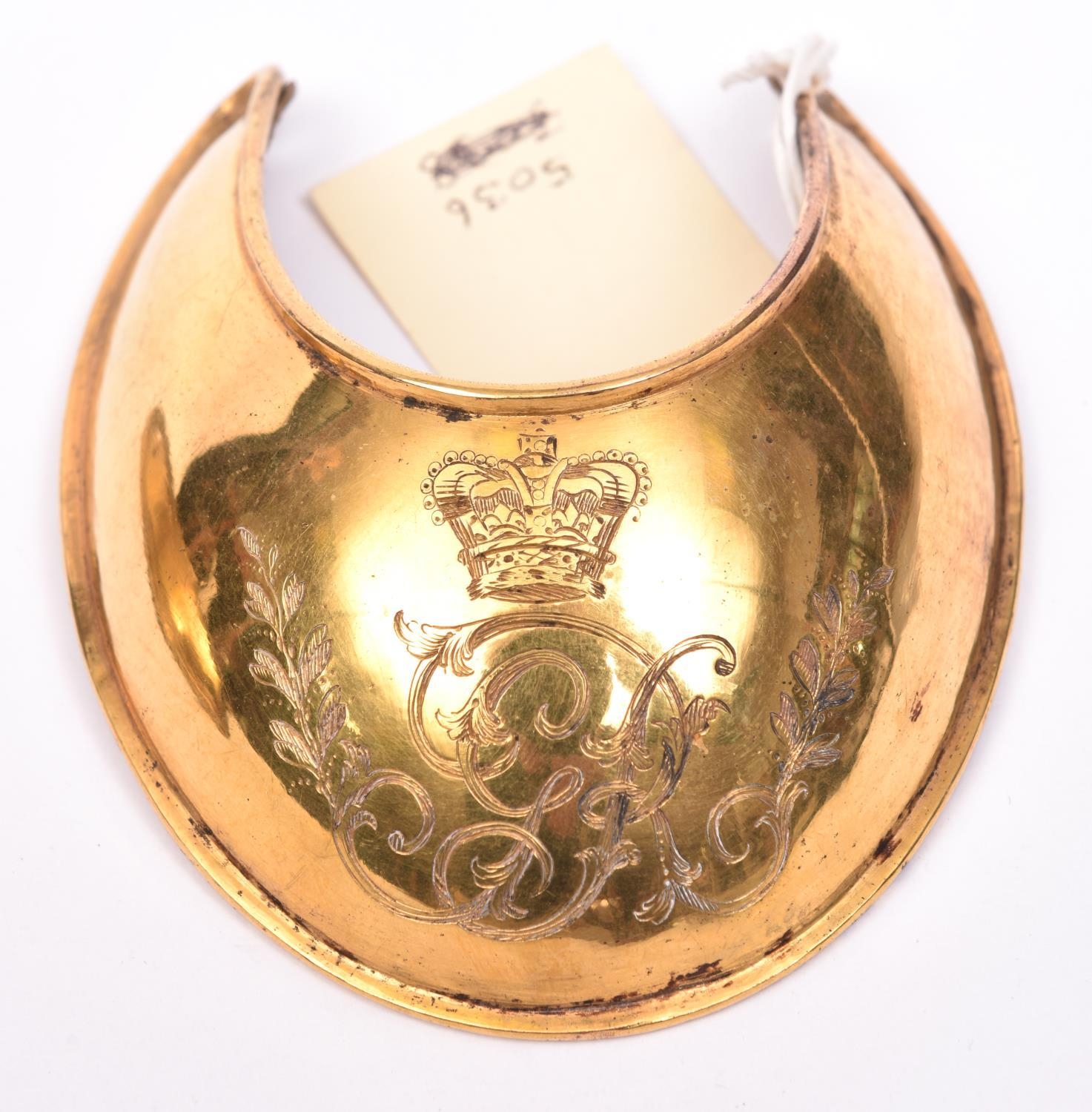 A George III officer’s gilt gorget, engraved with the Royal cypher ...