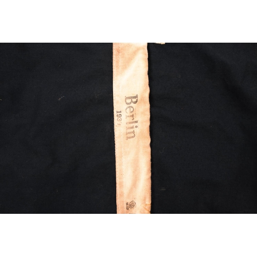 A Third Reich black SS flag, 37" x 24", applied SS runes. GC £30-40