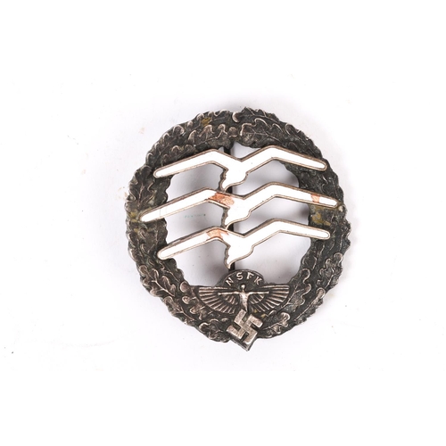 A Third Reich N.F.S.K. flying badge, 3 white enamelled stylised birds ...