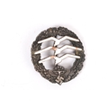 A Third Reich N.F.S.K. flying badge, 3 white enamelled stylised birds ...
