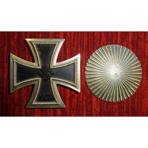 A good Third Reich Iron Cross first class, disc screw back fitting. VGC ...