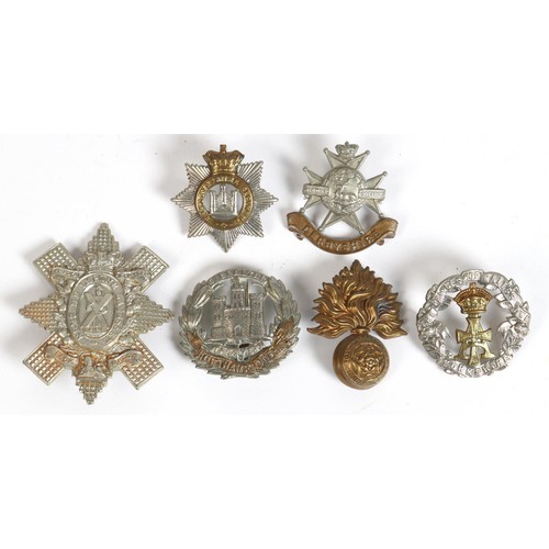 Four Victorian Infantry cap badges: Royal Fusiliers, Devonshire Regt ...