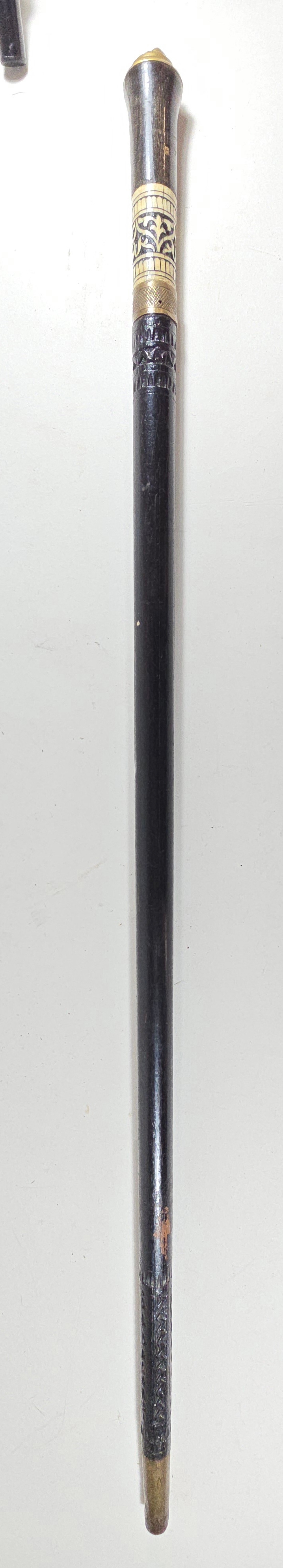A 20th century Indian sword stick, straight single edge blade 66cms cut ...