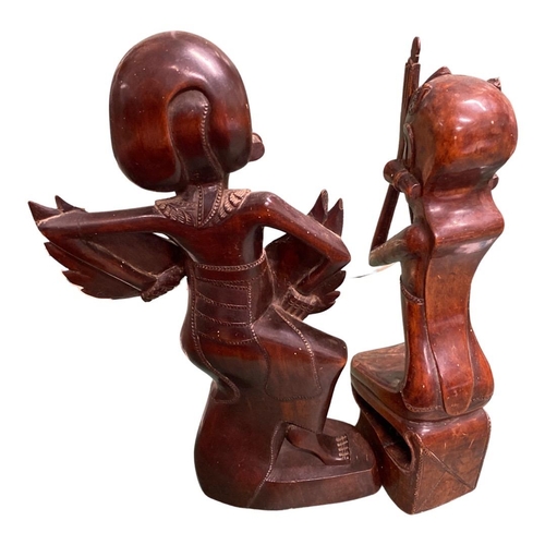 Two Wood carvings of Far East Holy Figures. One in kneeling prayer ...